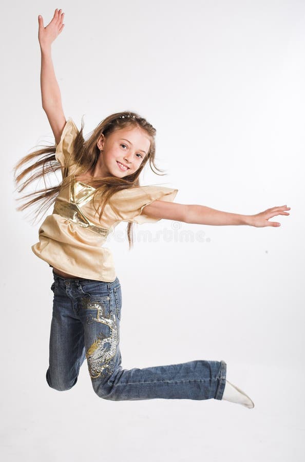 Happy and Beautiful School Girl Jumping Outdoor Stock Photo - Image of ...