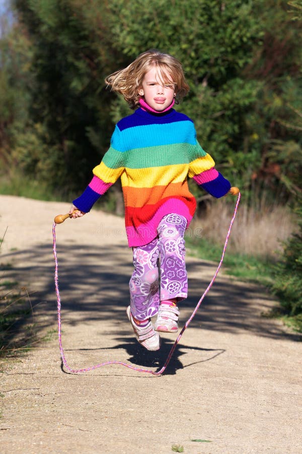 Girl jumping rope stock photo. Image of outside, healthy - 18989418