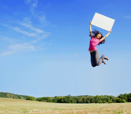 Girl Jumping with Sign stock image. Image of female, landscape - 6253733