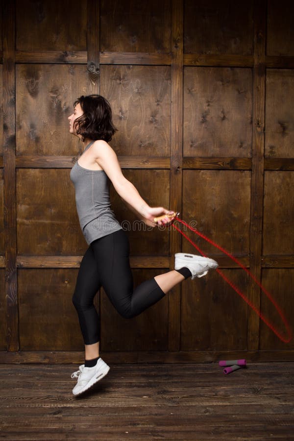 Girl Jumping on Skipping Rope Stock Photo - Image of tough, cheerful ...