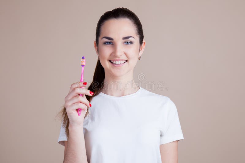 Girl Keeps a Toothbrush and Smiles Stock Photo - Image of cleaning ...