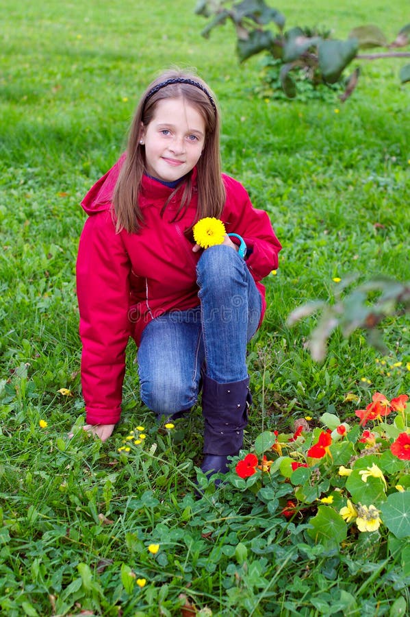 Girl Kid Posing with a Flower in a Meadow Stock Image - Image of casual ...
