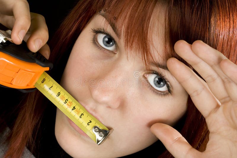 Girl Kissing Measuring Tool Stock Photo - Image of handyman, blue: 3743396