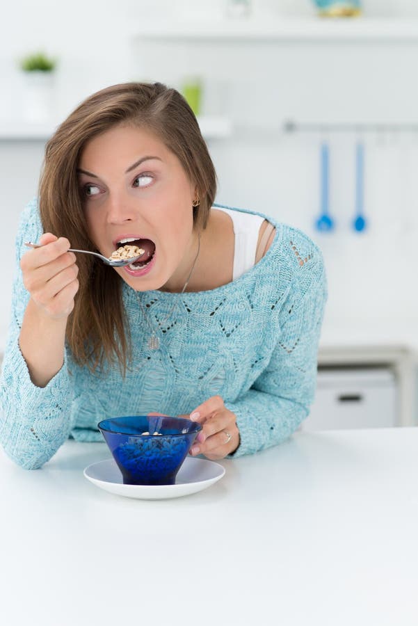 Girl in the Kitchen Eating Breakfast Stock Image - Image of kitchen ...