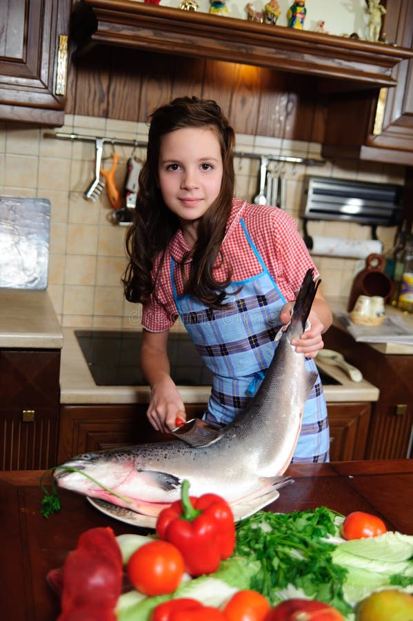 Girl in the Kitchen with Fish Stock Image - Image of little, interior ...