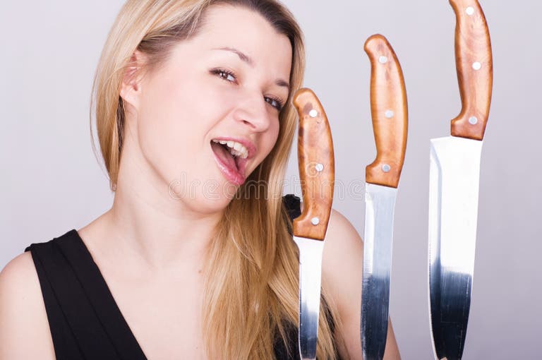 Girl with knives stock image. Image of black, emotion - 19964465