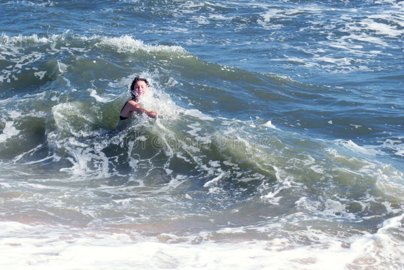 The Girl is Knocked Off High Waves by the Sea Stock Image - Image of ...