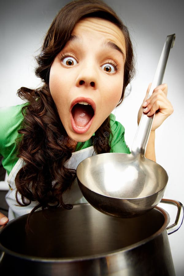 Girl with a ladle stock photo. Image of adult, emotions - 16538004