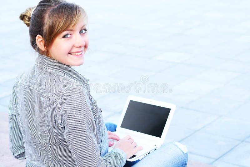 The girl with the laptop stock photo. Image of outdoors - 16457094