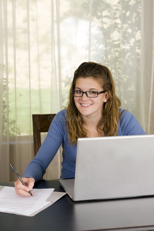 Young Girl with Laptop Doing Homework Stock Image - Image of portrait ...
