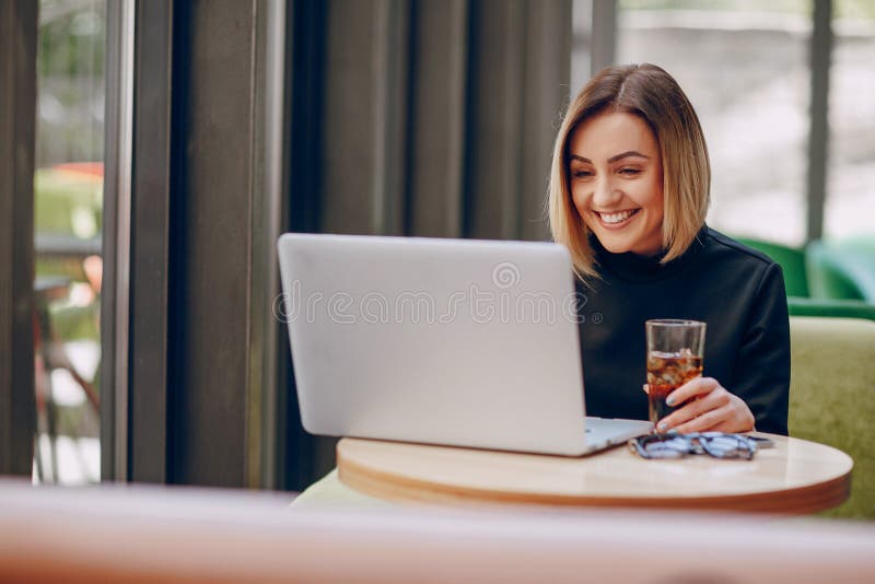 Girl laptop cafe cocktail stock photo. Image of beautiful - 95952582
