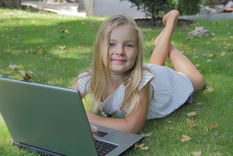 Girl with laptop stock image. Image of barefoot, summer - 38827797