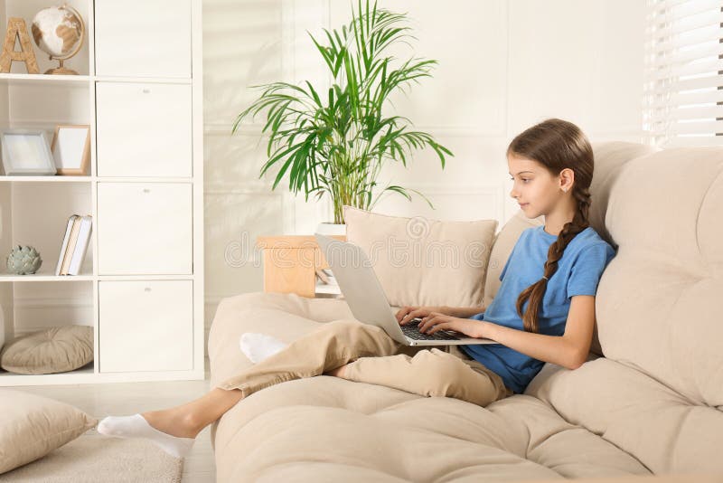 Girl with Laptop on Sofa at Home Stock Photo - Image of girl, internet ...