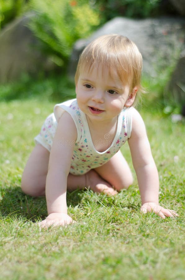 Girl on lawn stock image. Image of people, playing, real - 25636023