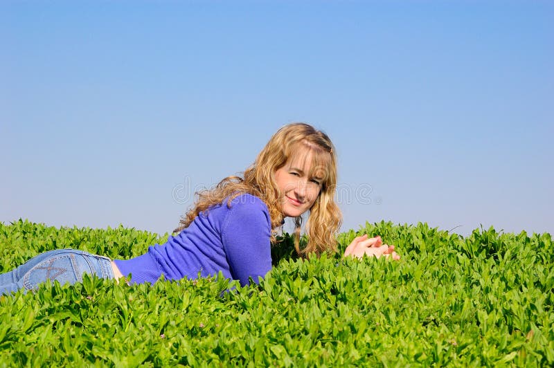 The girl lay on a grass stock image. Image of freshness - 11886169