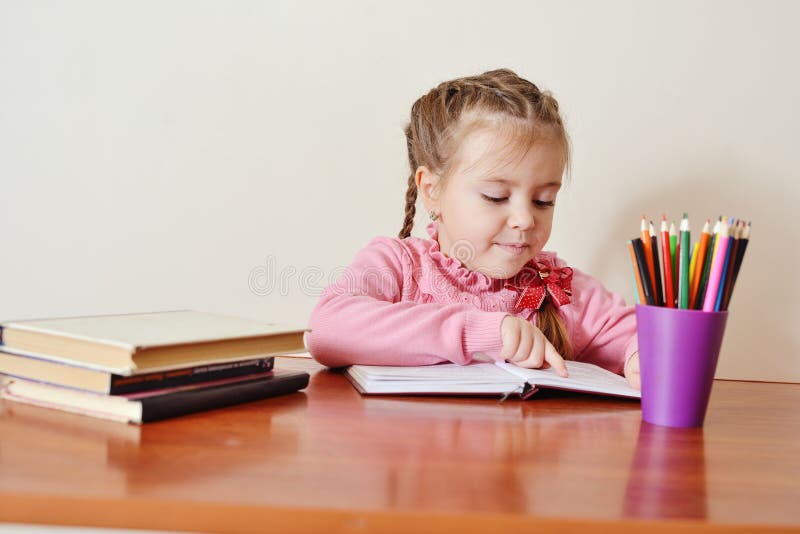 Girl learning reading stock image. Image of girl, beautiful - 142575231