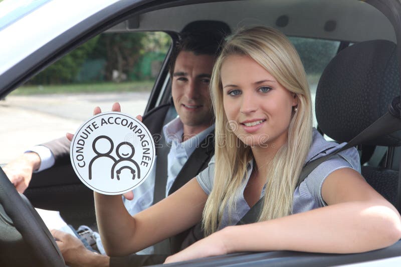 Girl learning to drive stock image. Image of school, license - 25435093