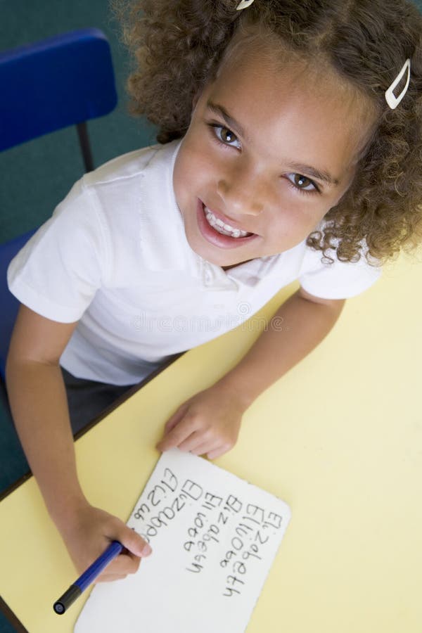 Girl Learning To Write Name in Primary Class Stock Image - Image of ...