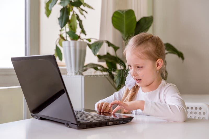 The Girl Learns through a Computer / Laptop Stock Image - Image of ...