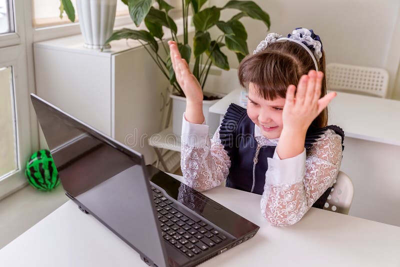 The Girl Learns Communicates, Talks through a Computer / Laptop Stock ...