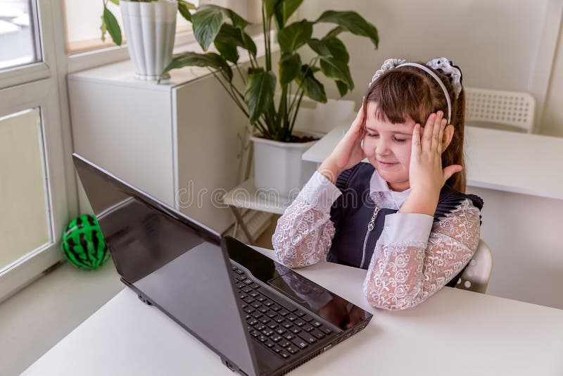 The Girl Learns Communicates, Talks through a Computer / Laptop Stock ...