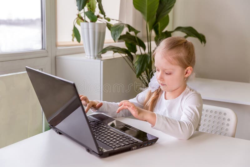 The Girl Learns through a Computer / Laptop Stock Image - Image of ...