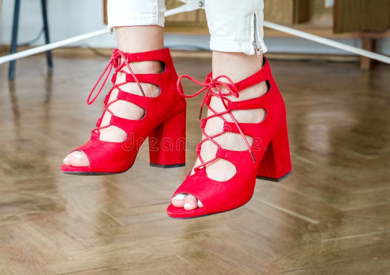 Girl legs in red shoes stock photo. Image of adult, footwear - 121003044