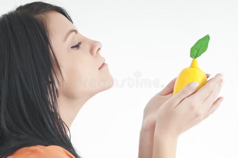Woman sucking on a lemon stock photo. Image of squeeze - 13558790