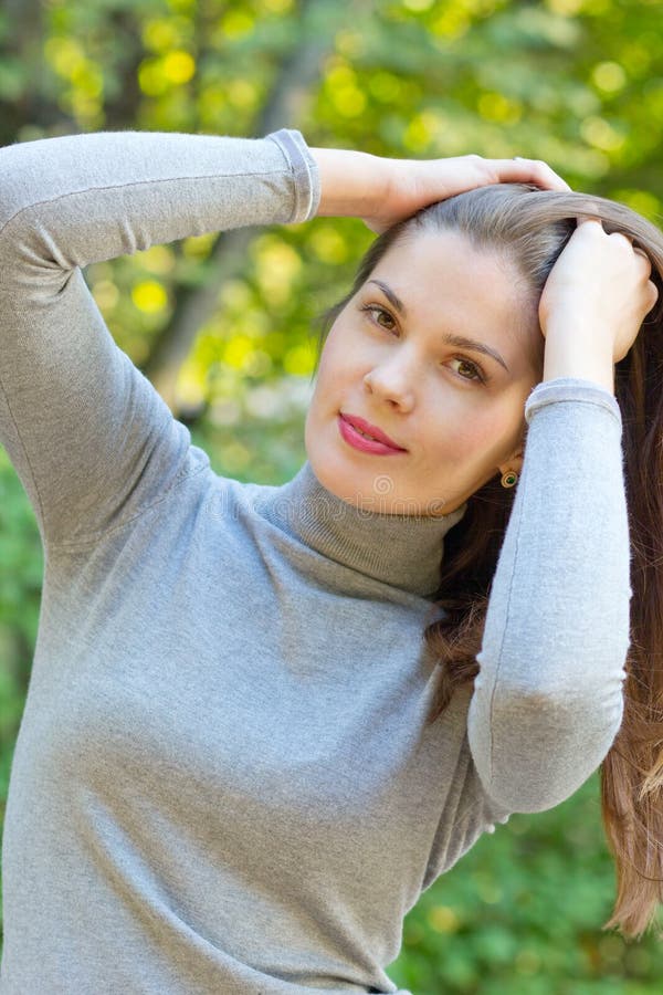 Girl Lets Hair Down Outdoors Stock Photo - Image of girl, beautiful ...