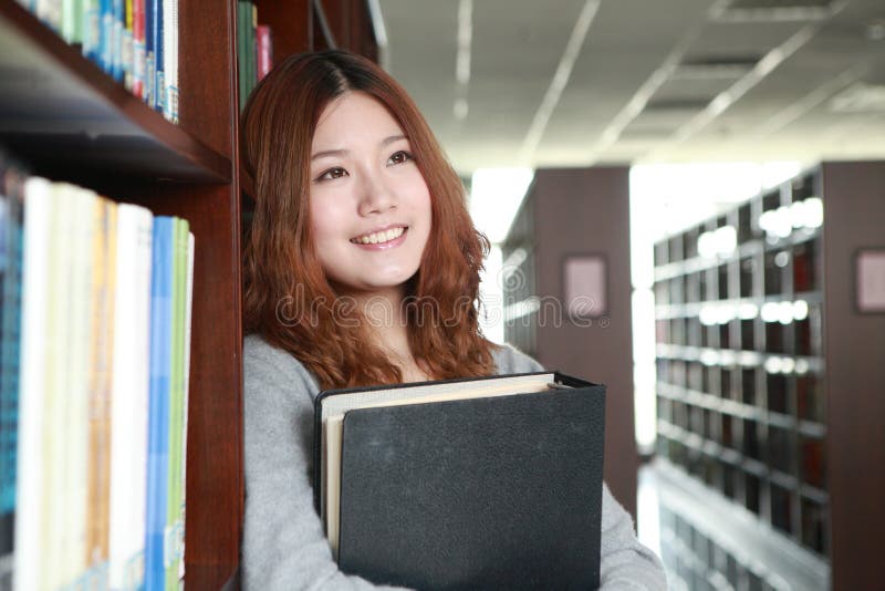 Girl in the Library stock photo. Image of study, young - 24583622
