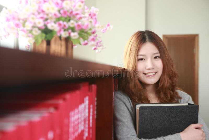 Girl in the Library stock photo. Image of study, young - 24583622