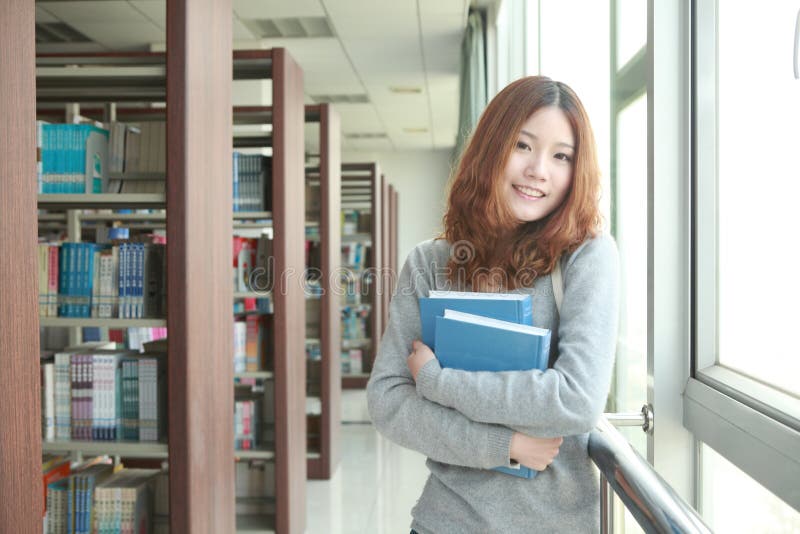 Pretty girl in library stock photo. Image of lady, student - 26222098