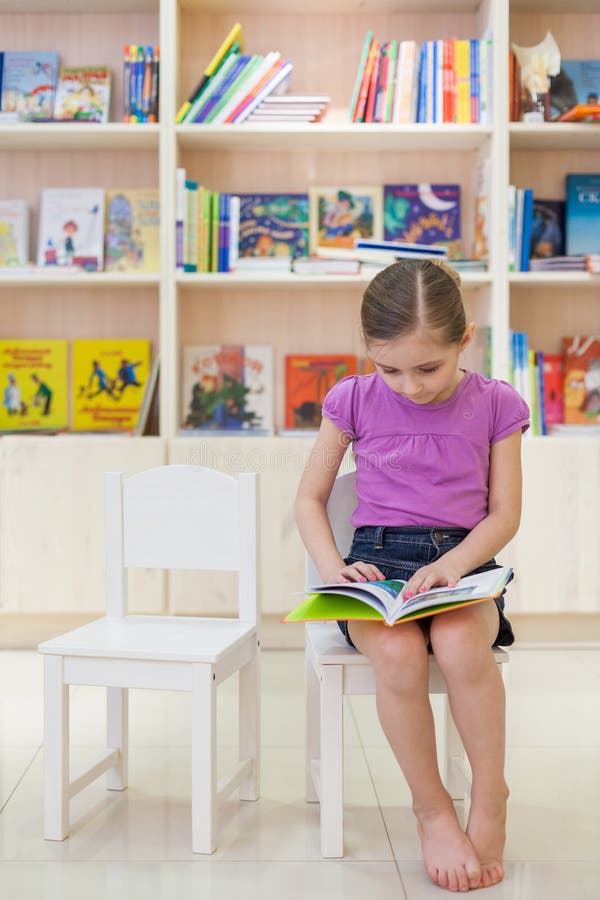 The Girl in the Library Reading a Book Stock Image - Image of knowledge ...