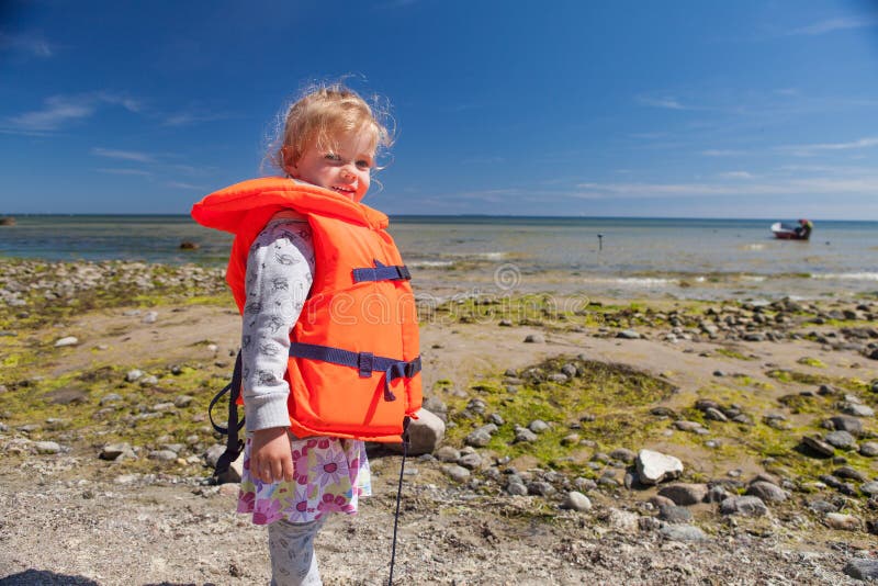 Girl with life jacket stock photo. Image of jacket, floating - 39777556