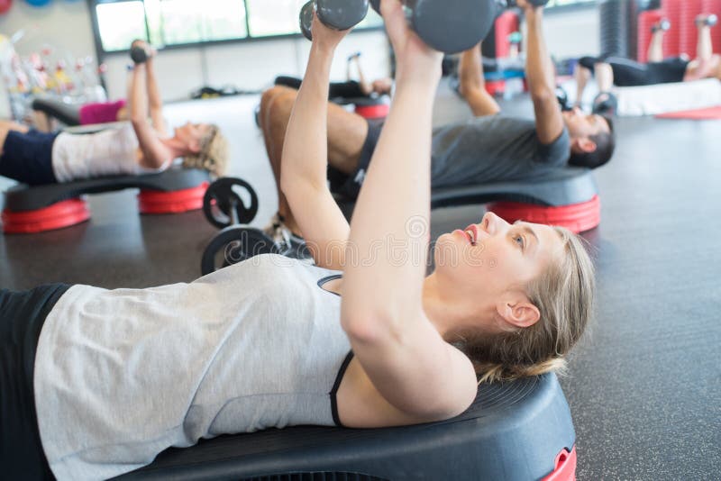 Girl lifting ba at gym stock photo. Image of shirtless - 102275676