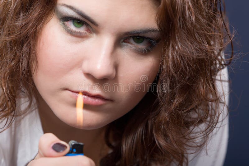 Girl with a lighter stock image. Image of close, fashion - 16640555