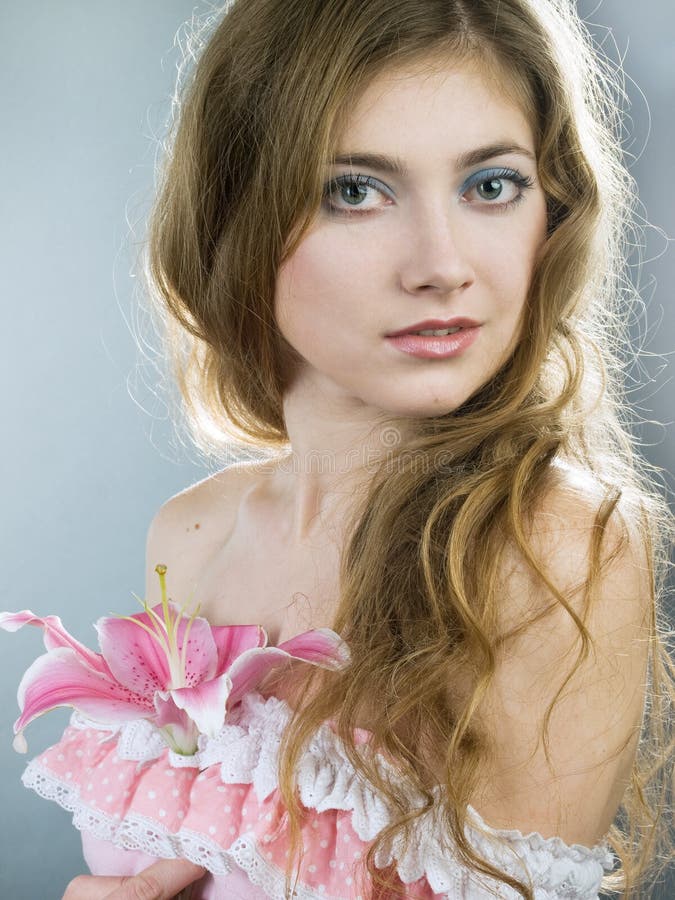 Girl with lily stock image. Image of female, calm, adult - 8793045