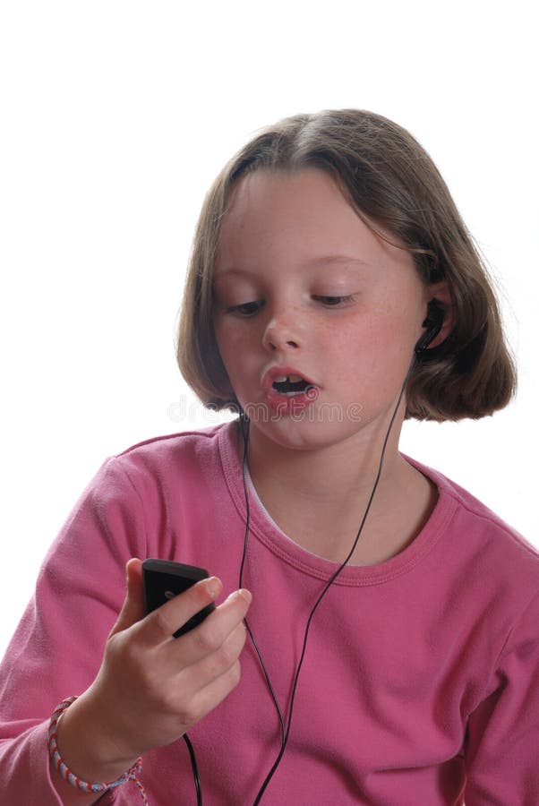 Girl Listening To Mp3 Player Stock Image - Image of enjoying, adjusting ...