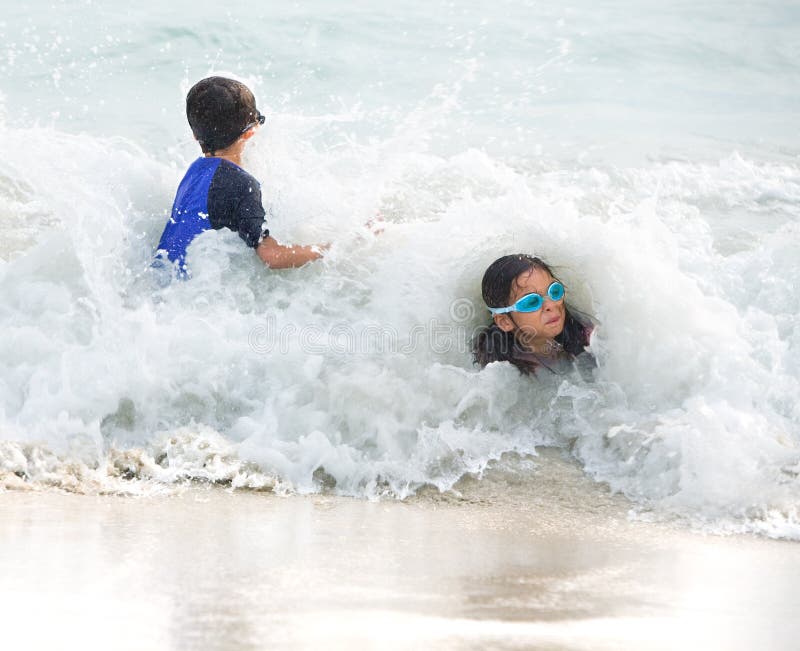 Little Girl Hit Wave Beach Stock Photos - Free & Royalty-Free Stock ...