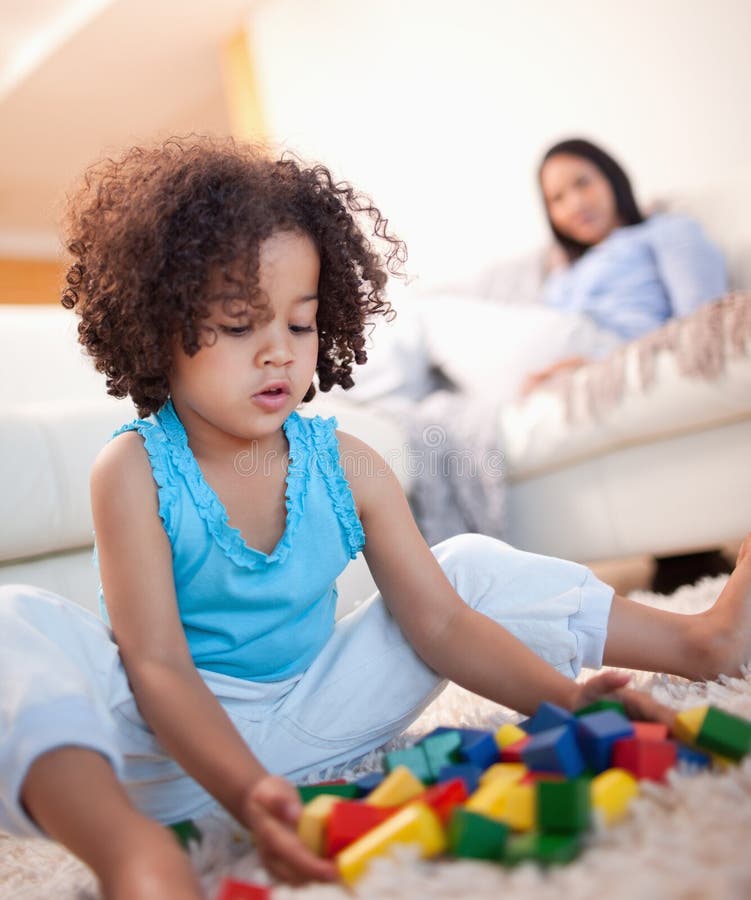 Girl in the Living Room Playing with Toy Blocks Stock Image - Image of ...
