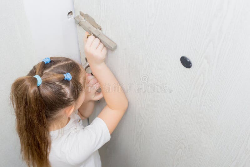 Girl Locking the Door at Home: Learning Safety, Independence, and ...