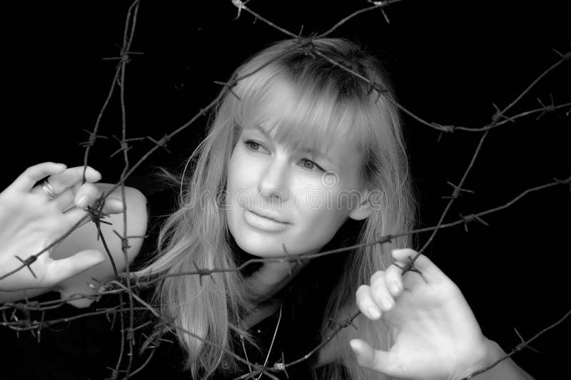 Girl Looking through Barbed Wire Stock Image - Image of erotic, blonde ...