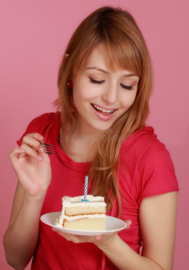 Girl looking at cake stock image. Image of birthday, pink - 12696427