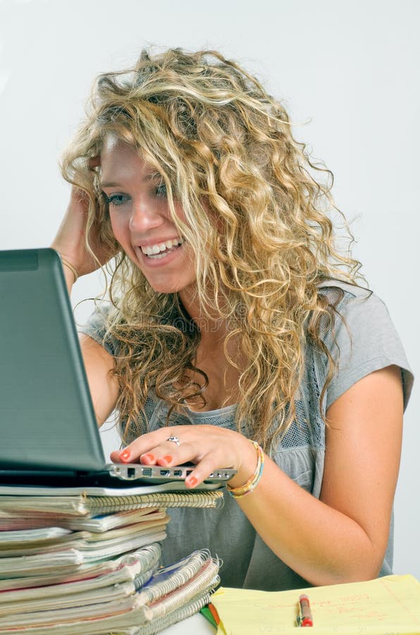 Girl looking at computer stock image. Image of student - 20664383