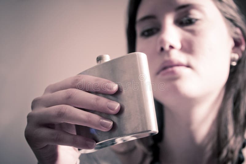 Girl looking at flask stock photo. Image of ponder, bottle - 2543820