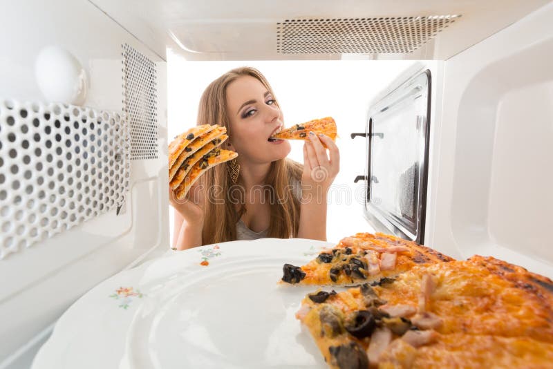 The Girl Looking in a Microwave Stock Photo - Image of appliance ...