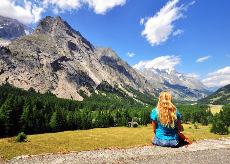 Girl looking at mountains stock photo. Image of mountains - 59076428