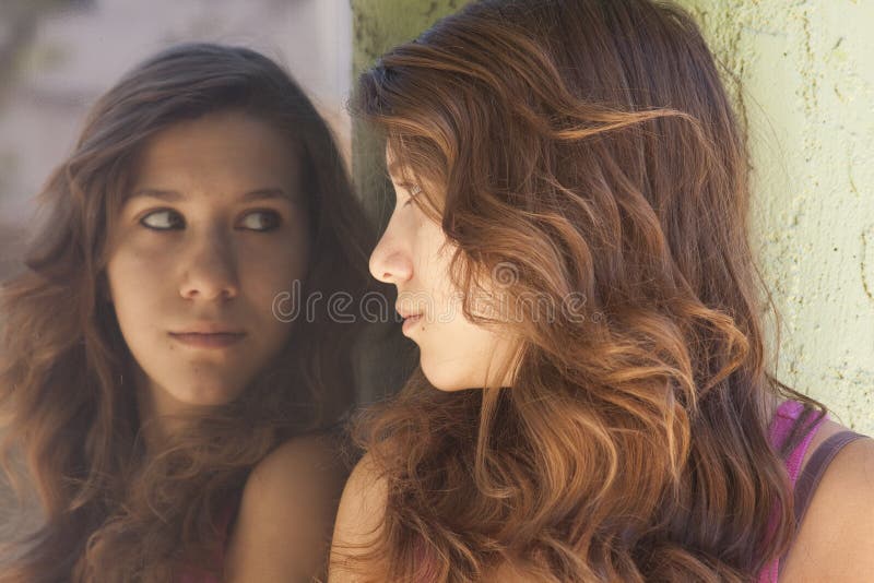 Girl Looking at Reflection stock image. Image of admiring - 28130615