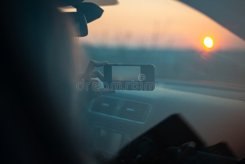 Girl Looking at the Sunset from the Car Window Stock Photo - Image of ...