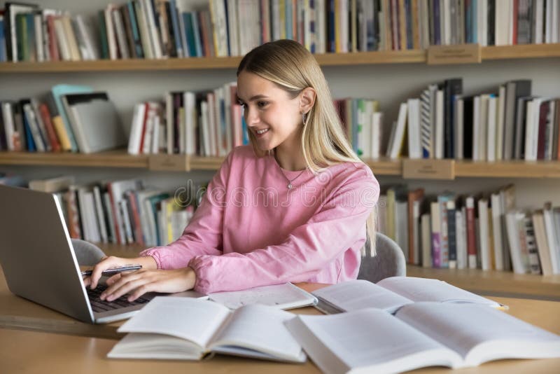 Girl Looking Up Information for Coursework Using Internet Stock Image ...